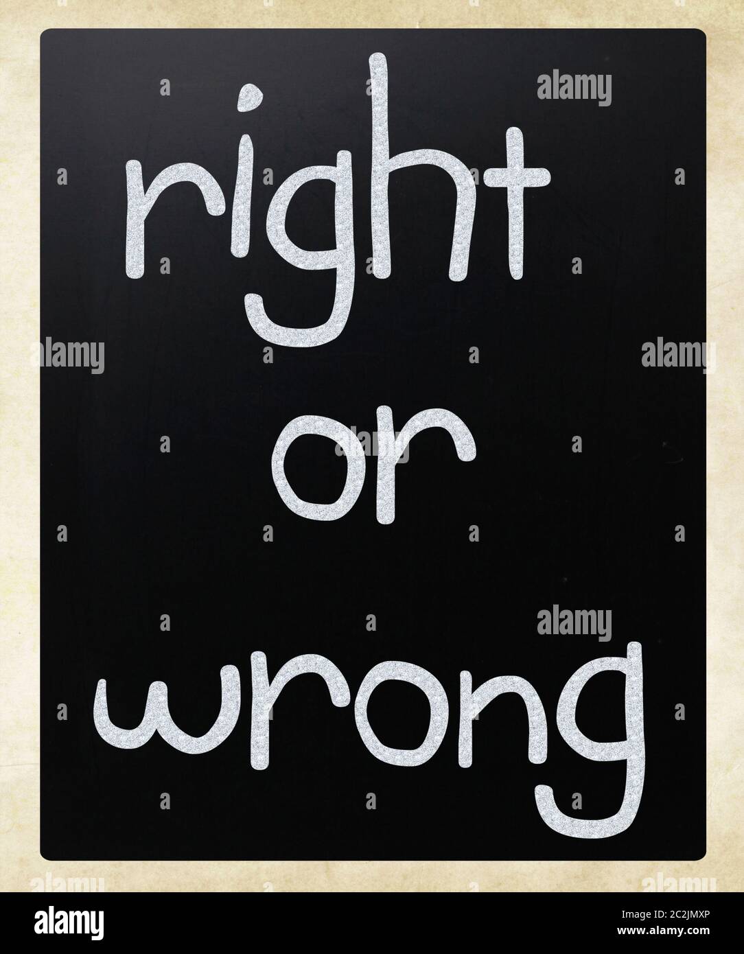 "Right or wrong" handwritten with white chalk on a blackboard Stock ...
