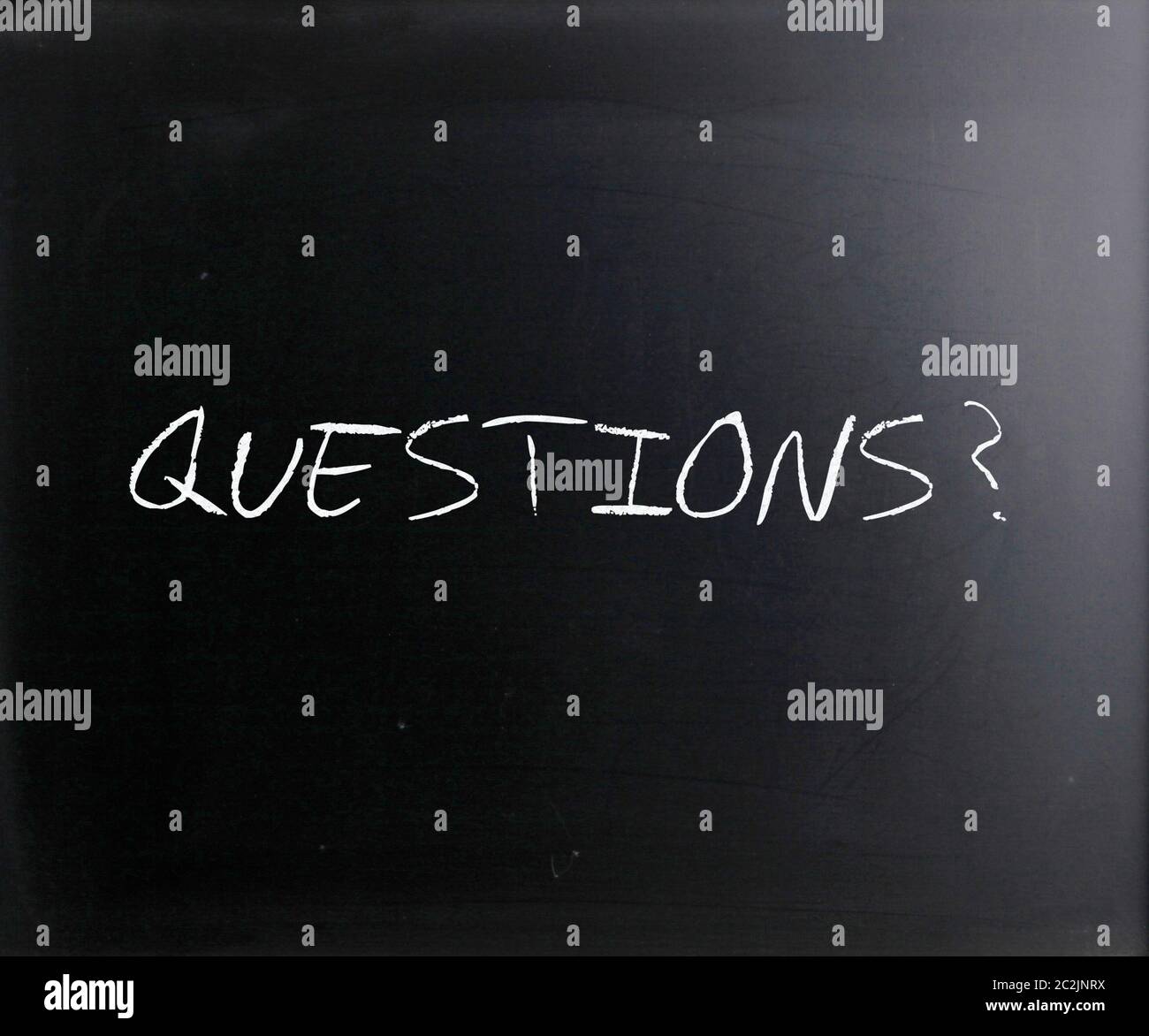 "Questions?" handwritten with white chalk on a blackboard Stock Photo ...