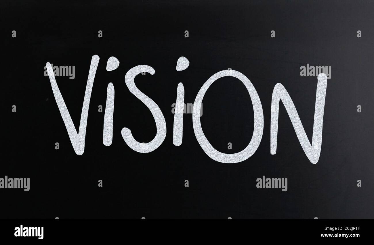 The word "Vision" handwritten with white chalk on a blackboard Stock ...
