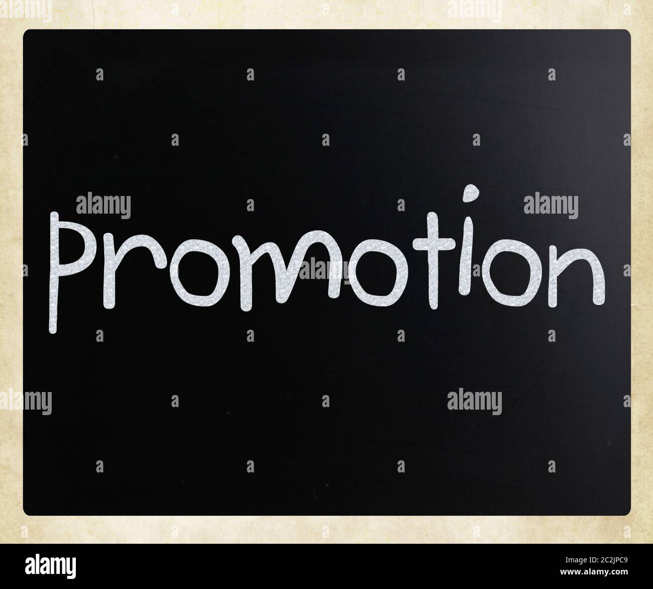 The word "promotion" handwritten with white chalk on a blackboard Stock ...