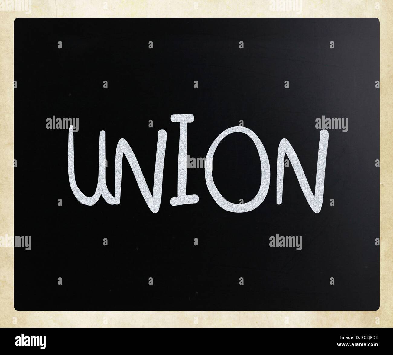 The word "Union" handwritten with white chalk on a blackboard Stock ...