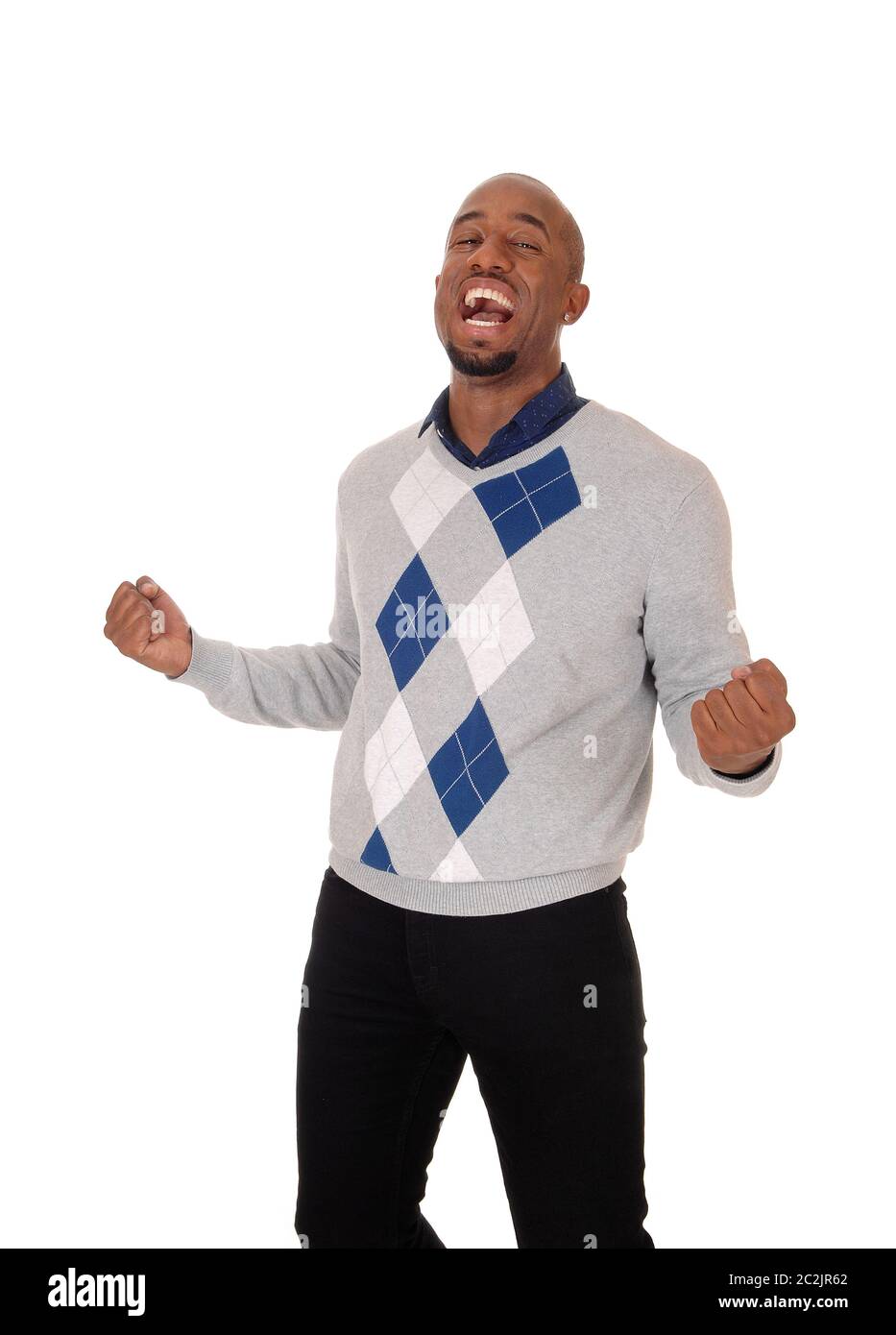 A tall handsome African American man standing screaming with his hands ...