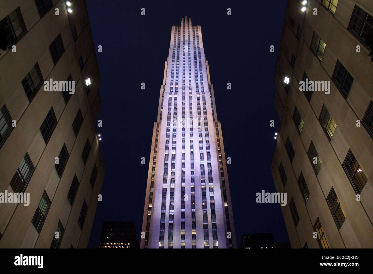 Pink illuminated skyscraper in Midtown New York City Stock Photo - Alamy