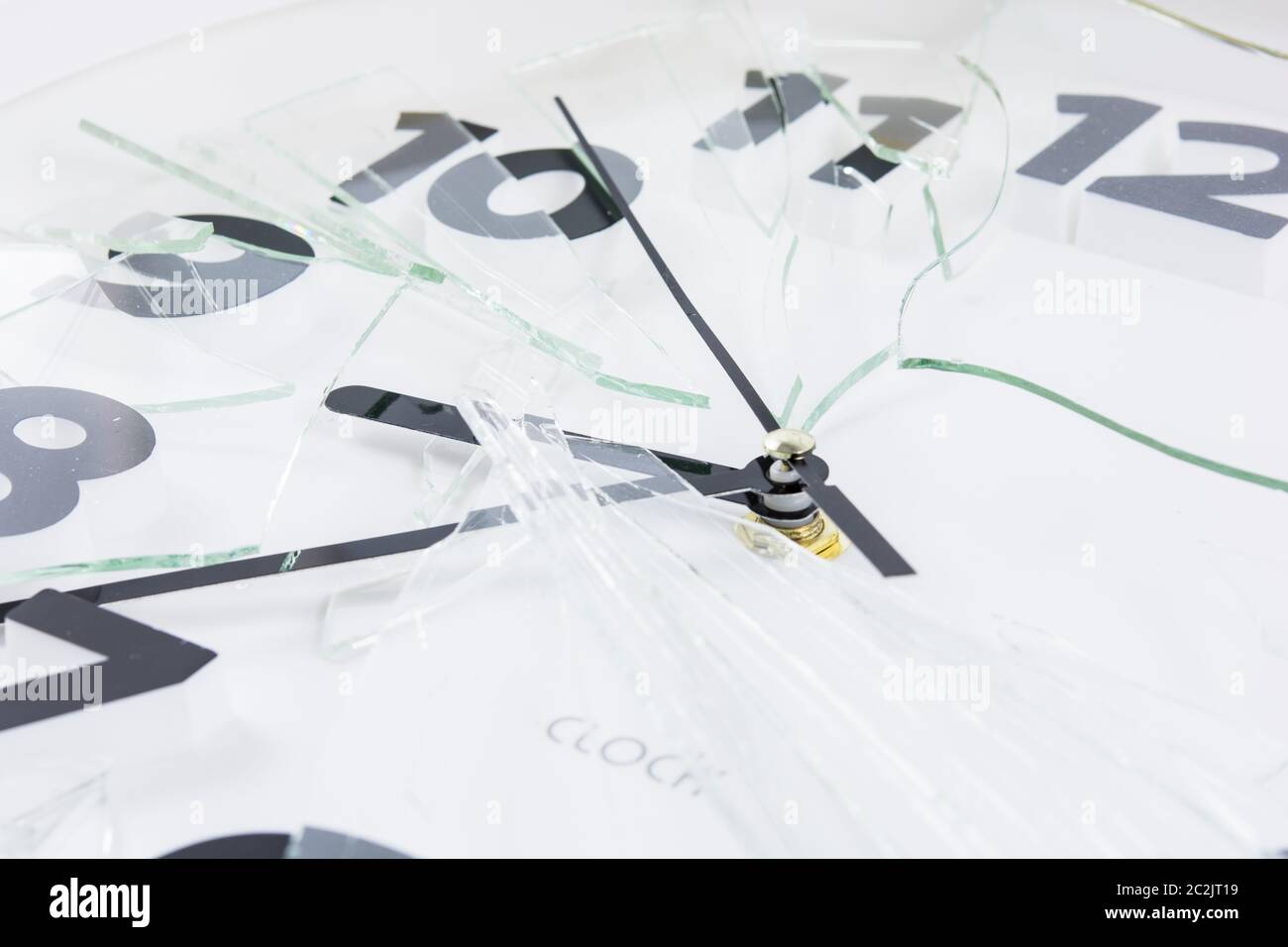 White clock is broken glass isolated on white background Stock Photo ...
