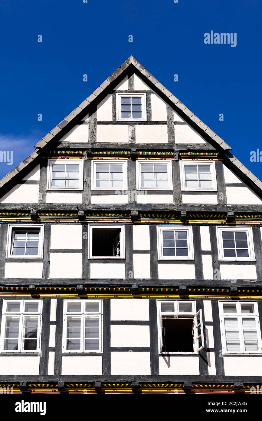 Half-timbered gable with wooden windows of an old half-timbered house ...