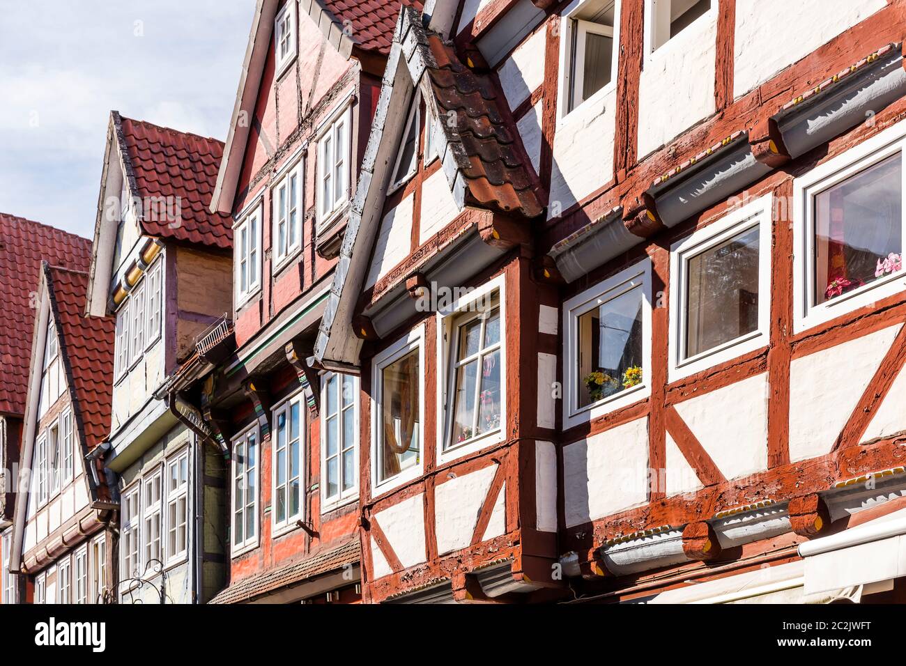 Half-timbered gable with wooden windows of an old half-timbered house ...