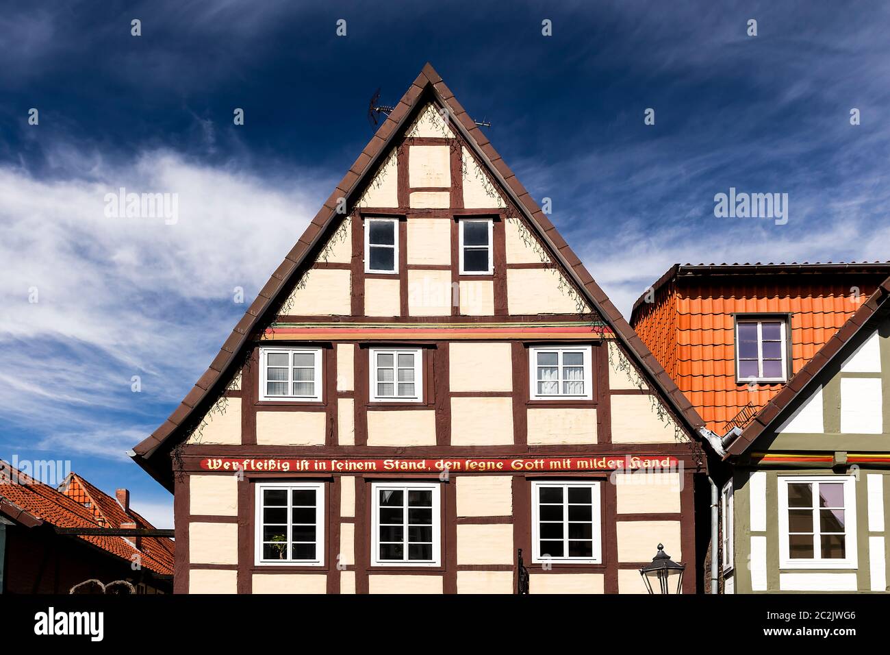 Half-timbered gable with wooden windows of an old half-timbered house ...
