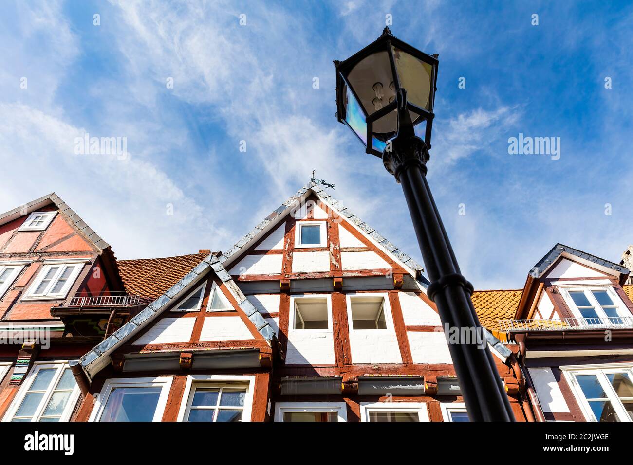 Half-timbered gable with wooden windows of an old half-timbered house ...