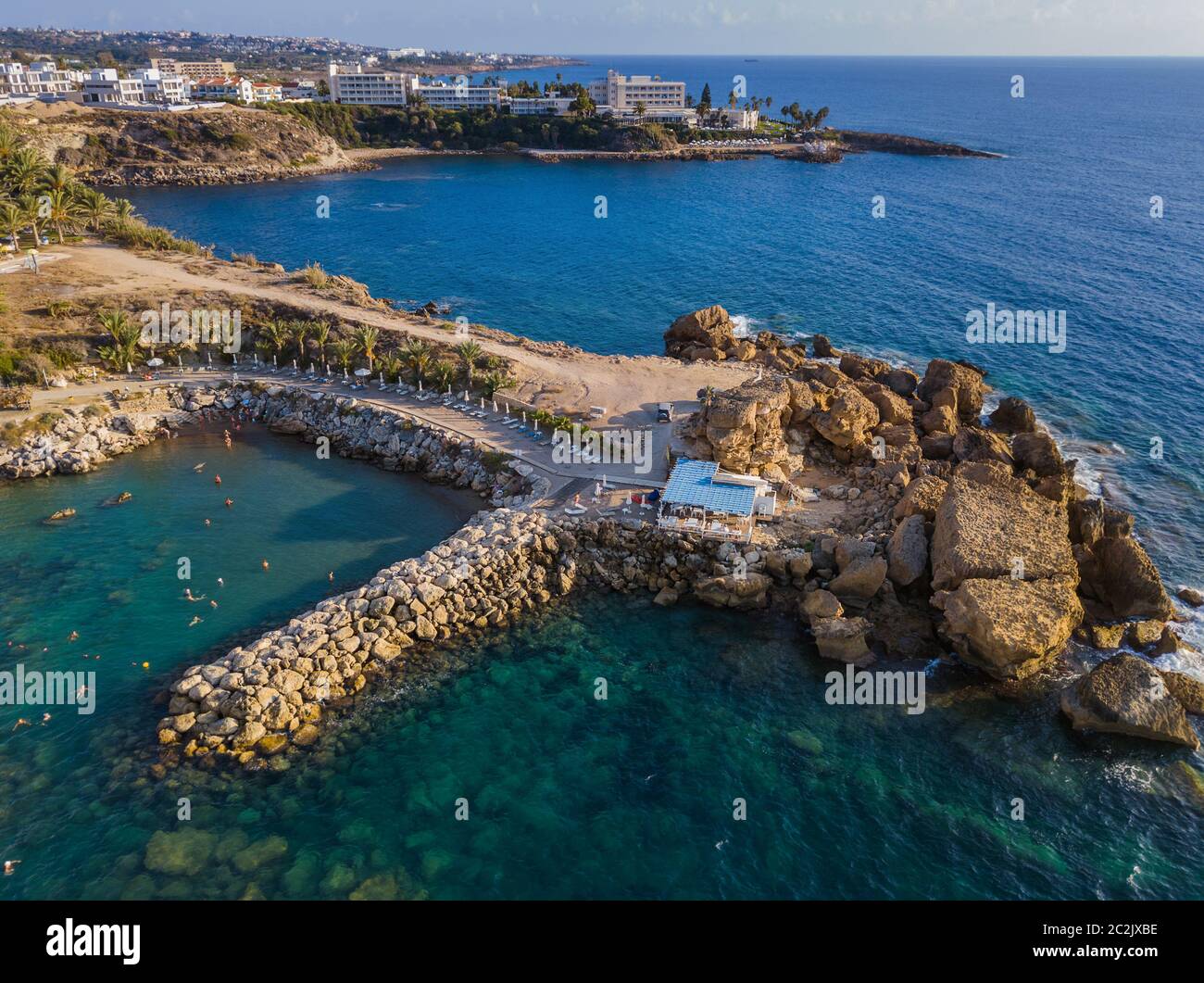 Beach on Cyprus island at sunset Stock Photo - Alamy