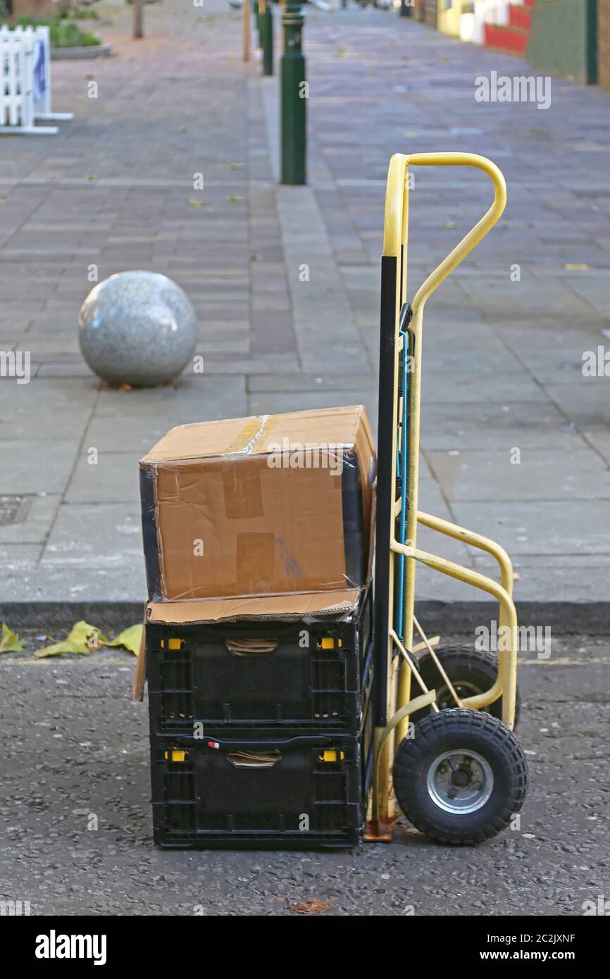 Hand Cart Dolly Loaded With Box and Crates at Street Delivery Stock ...