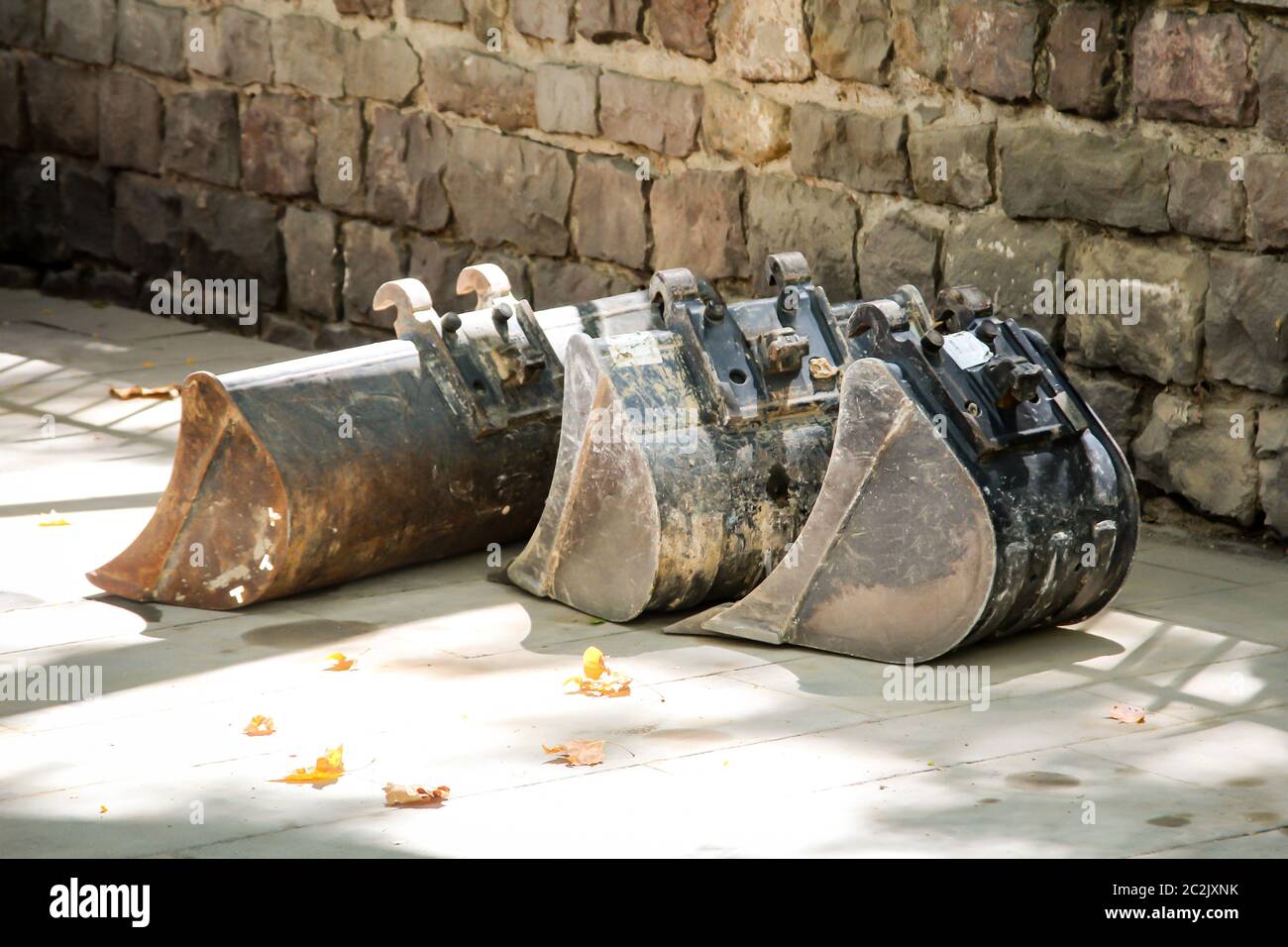 Excavator and excavator tools, excavator shovels on a construction site ...