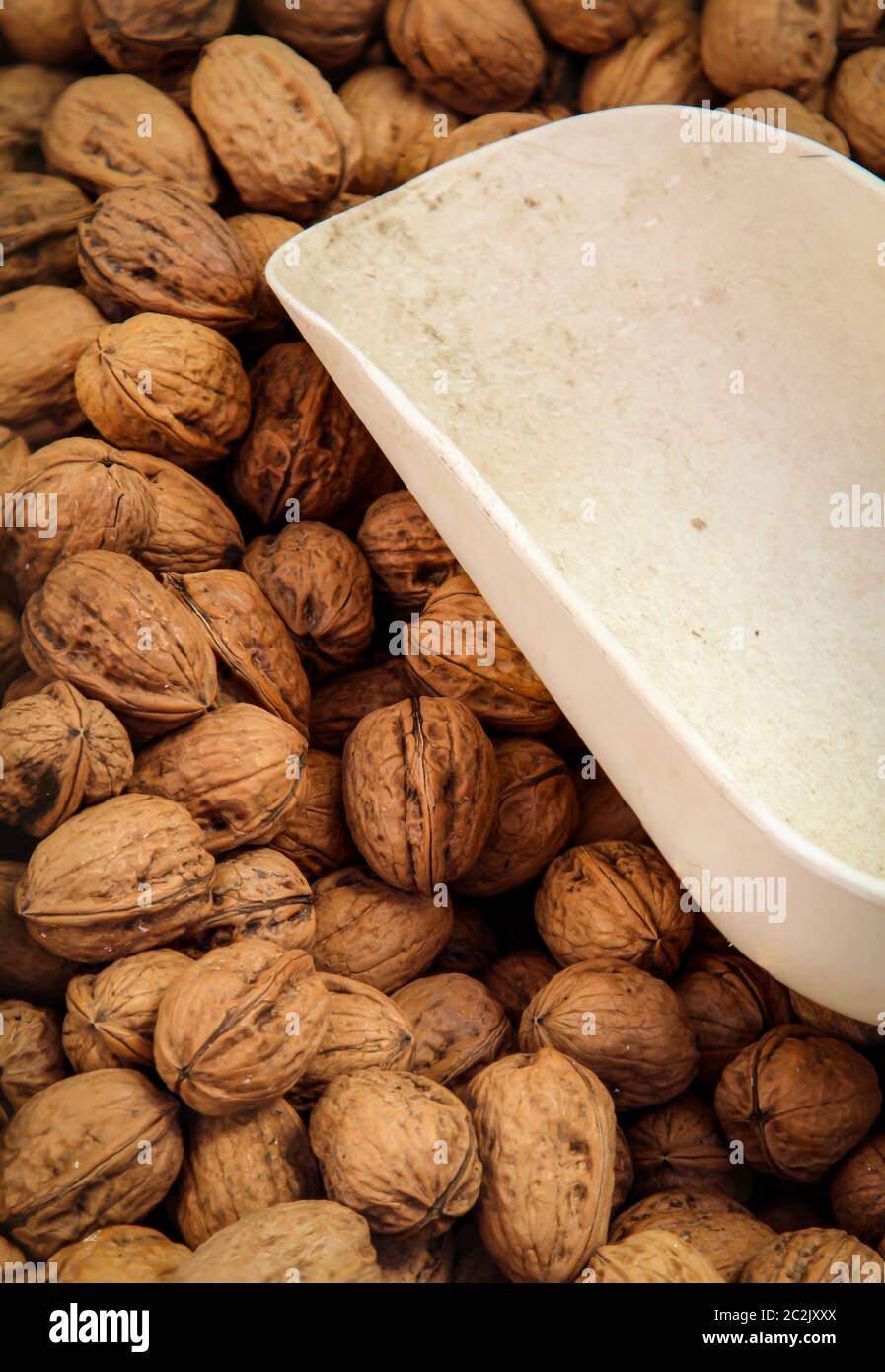 Many walnuts for sale, nuts are good for your health Stock Photo - Alamy