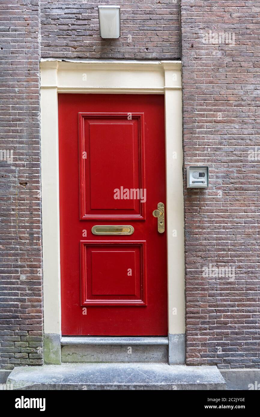 Red Door at Residential House in Amsterdam Stock Photo - Alamy
