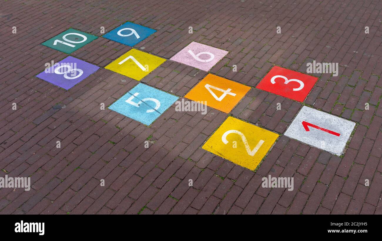 Colourful Hopscotch Playground Markings Numbers at Pavement Stock Photo ...