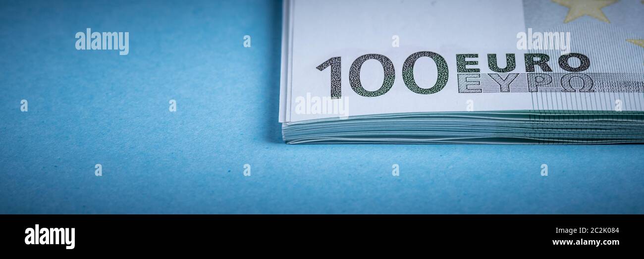 Euro cash on a blue and pink background. Euro Money Banknotes. Euro ...