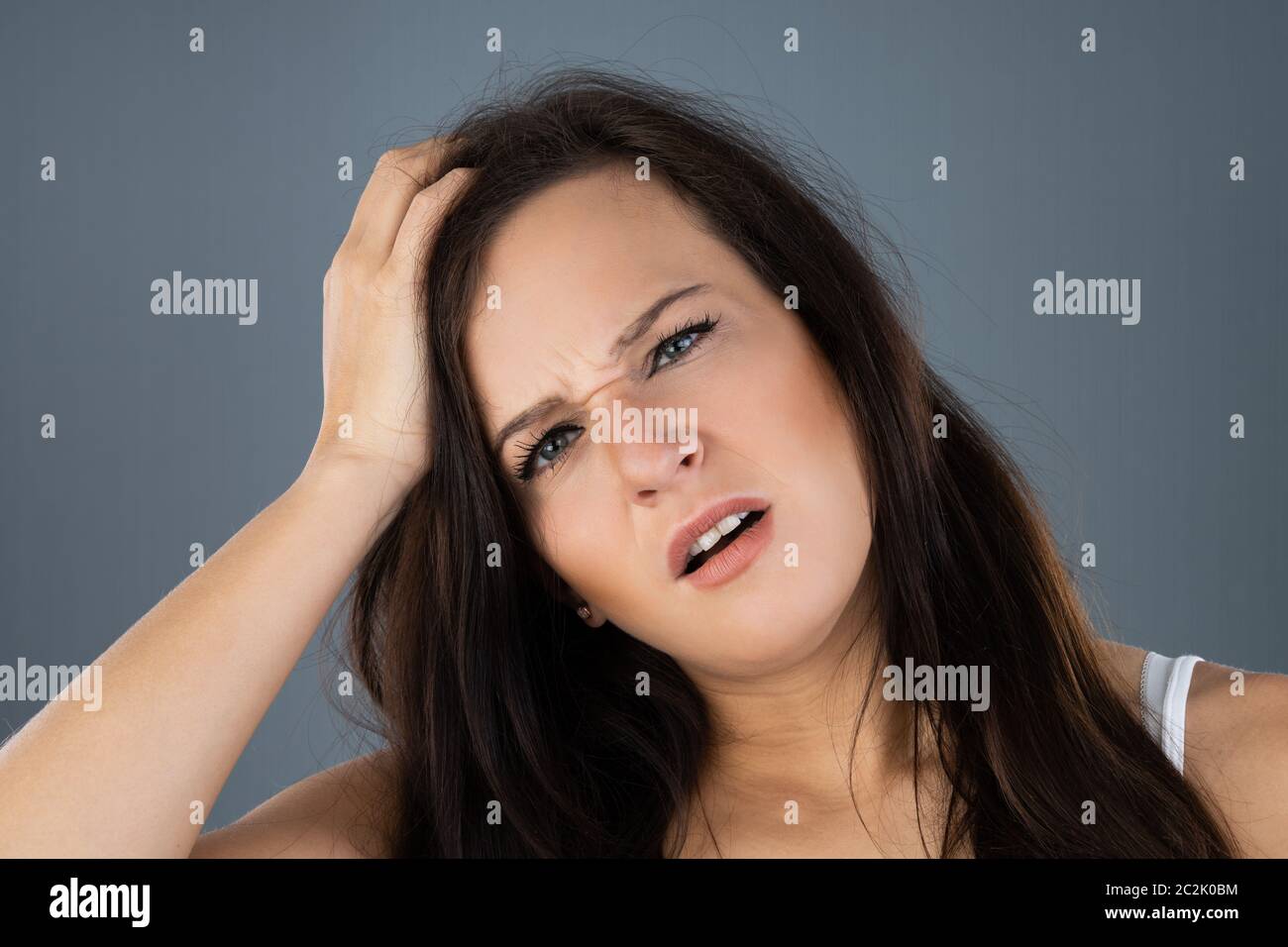 Young Woman Scratching Her Itchy Head Scalp Stock Photo - Alamy