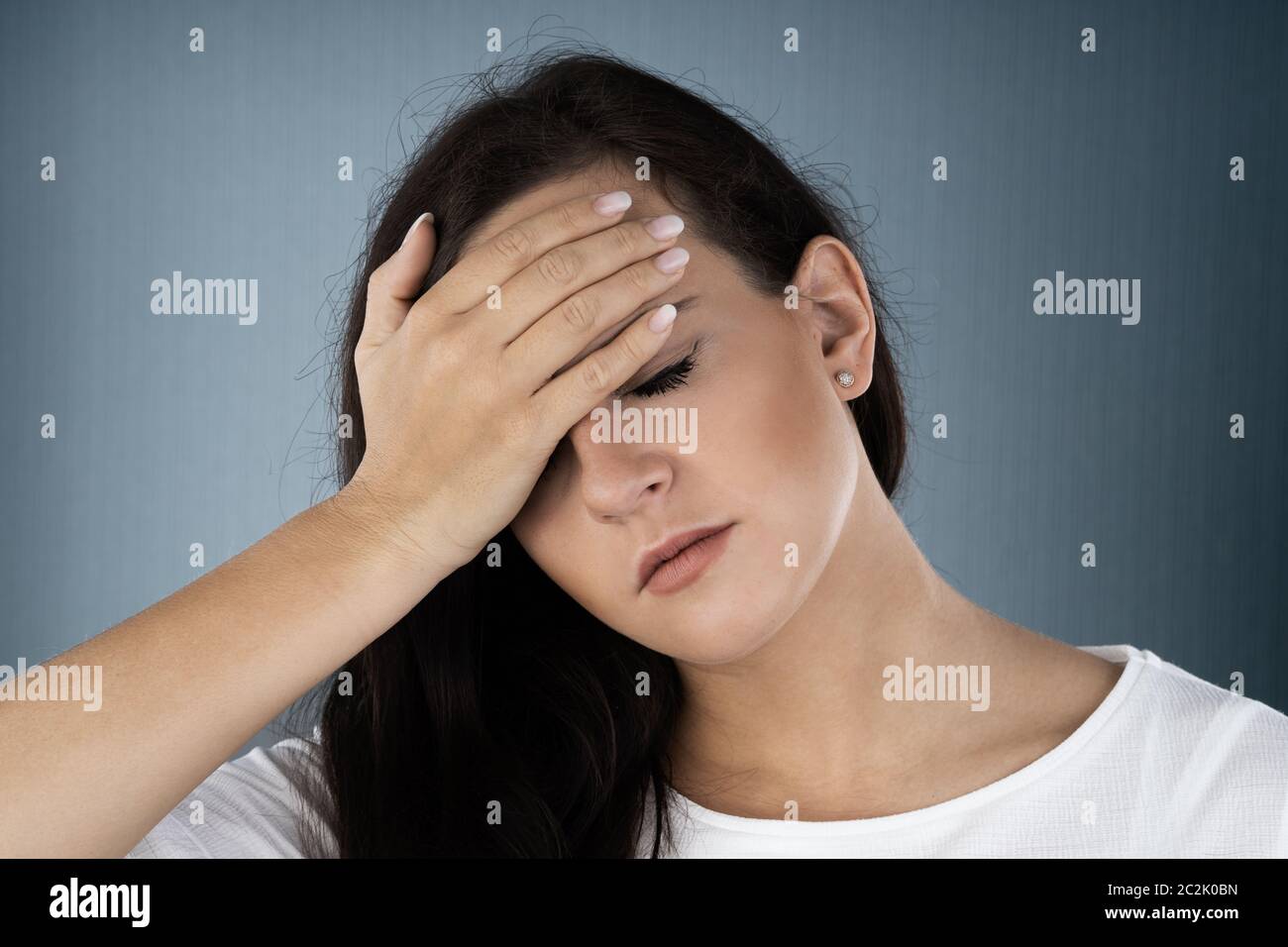 Photo Of Young Woman Suffering From Brain Overload Stock Photo - Alamy
