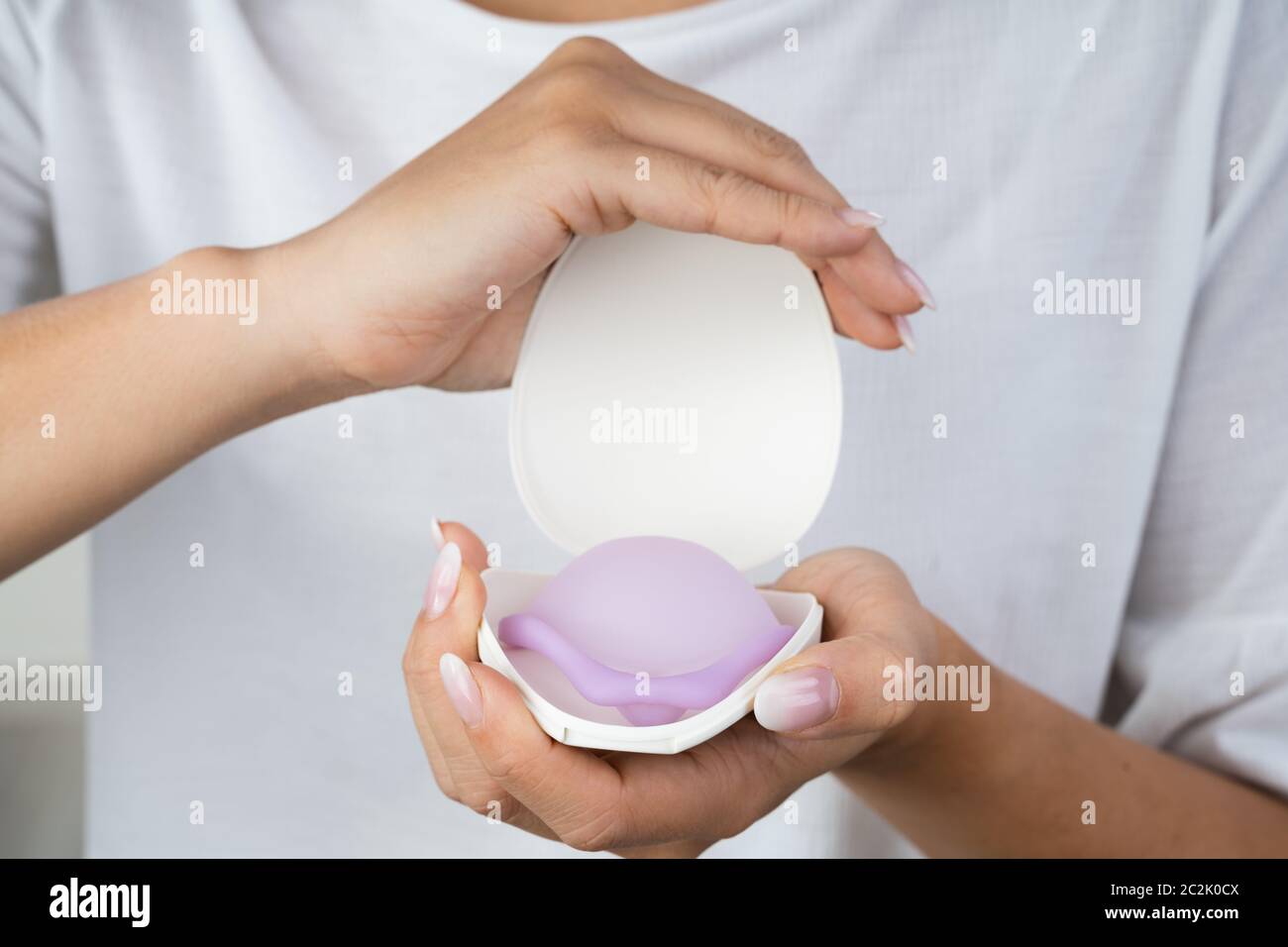 Photo Of Woman Holding Diaphragm For Contraceptive Use Stock Photo - Alamy