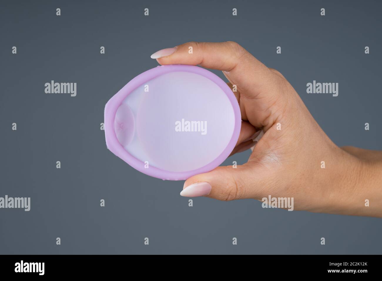Photo Of Woman Holding Diaphragm For Contraceptive Use Stock Photo - Alamy