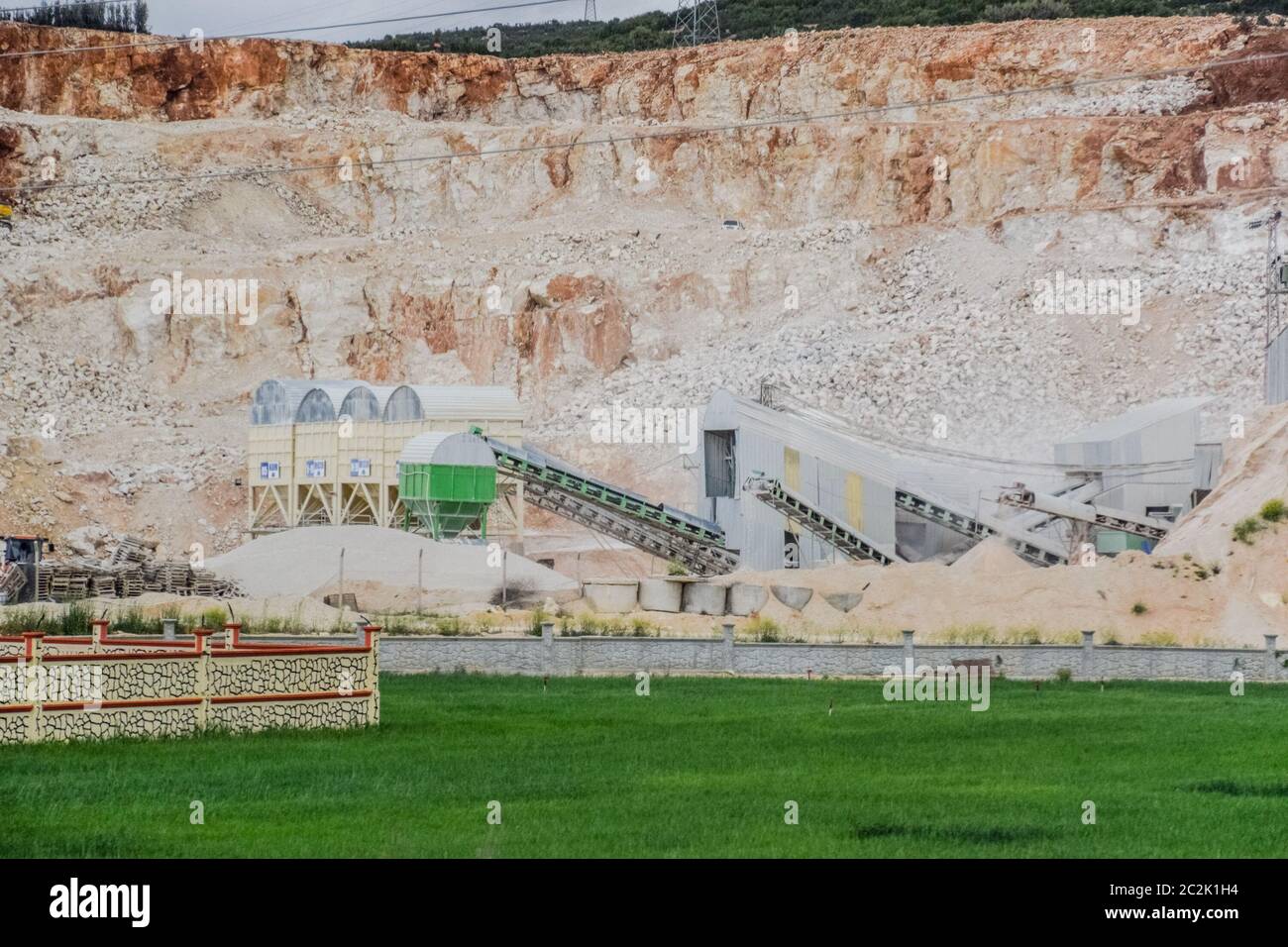 Marble quarry quarrying white marble in an open pit Stock Photo - Alamy
