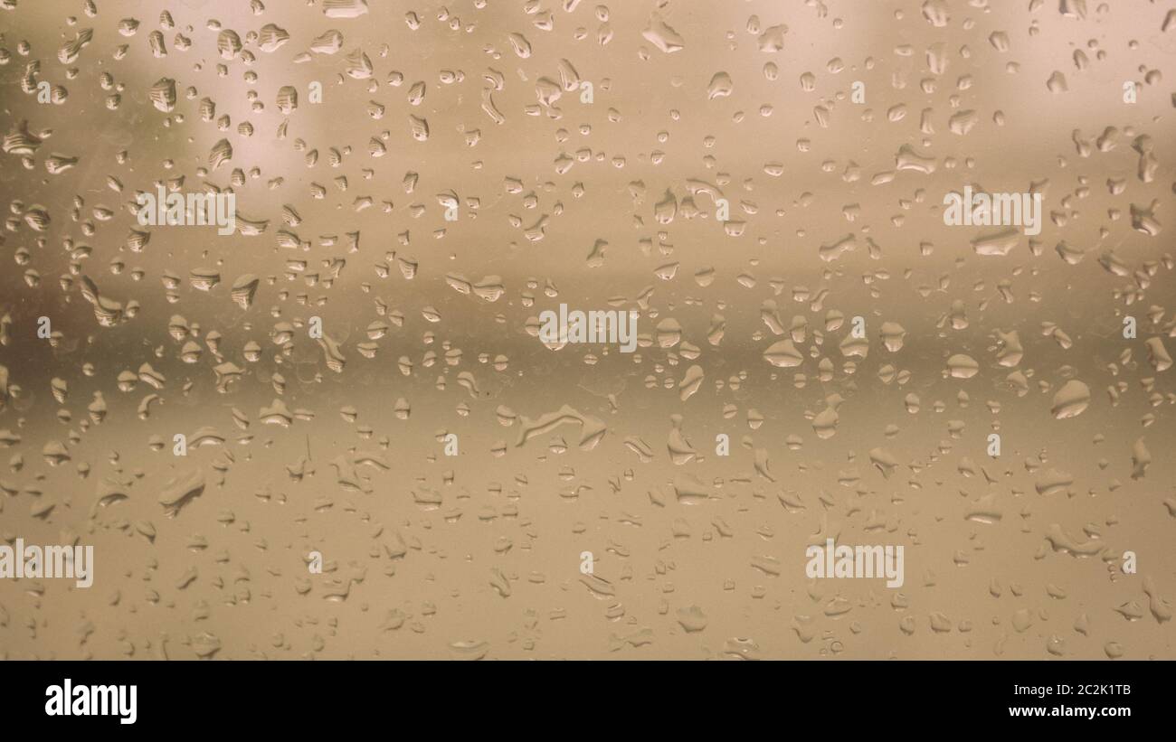 Rain Drops On Surface of wet Window Glass pane In Rainy Season ...