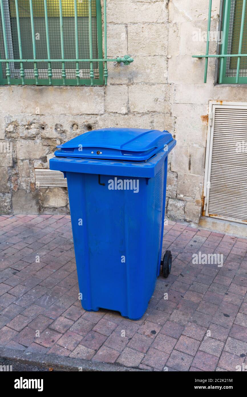One Big Blue Wheelie Bin in Front of House Stock Photo - Alamy