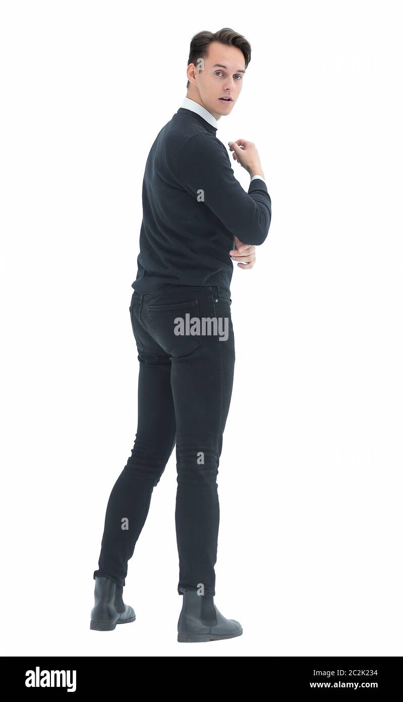 rear view. surprised young man looking at the camera Stock Photo - Alamy