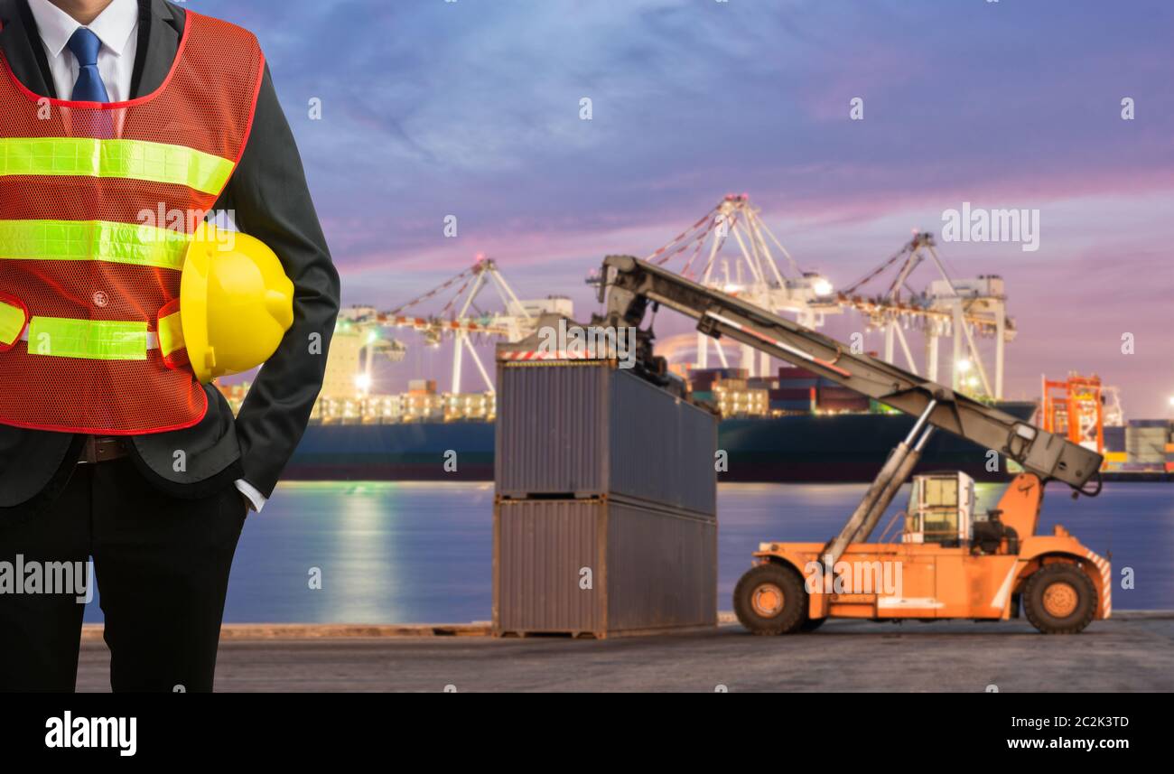Foreman or working man control loading Containers box to Logistic cargo ...