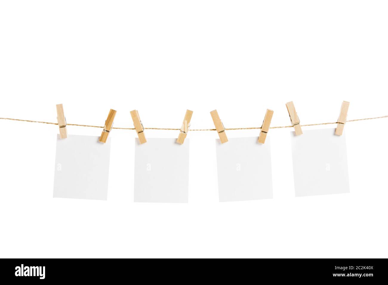 paper cards hanging rope isolated on white background Stock Photo - Alamy