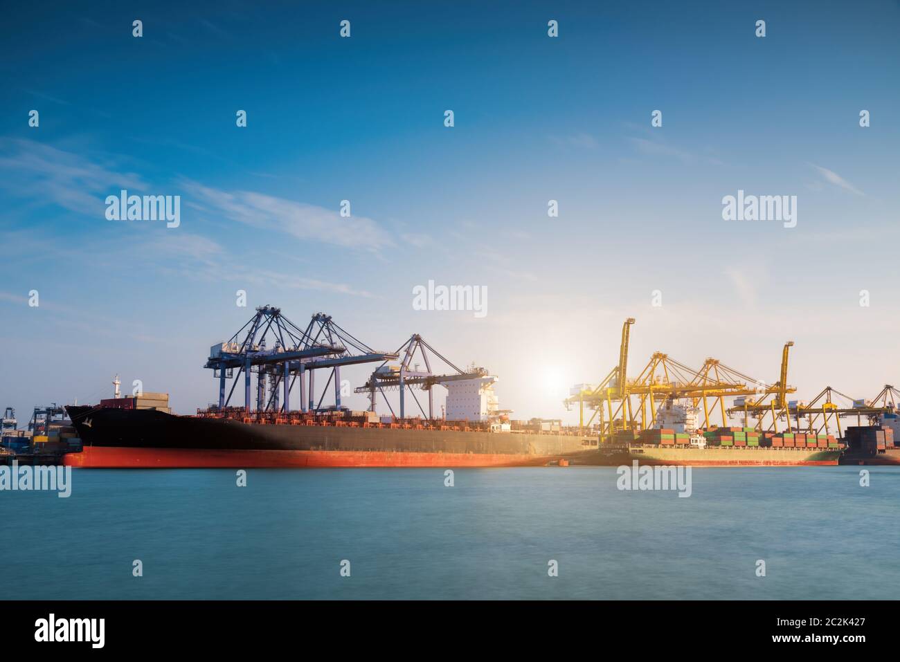 Containers cargo loading box by crane Trade Port Shipping Stock Photo ...