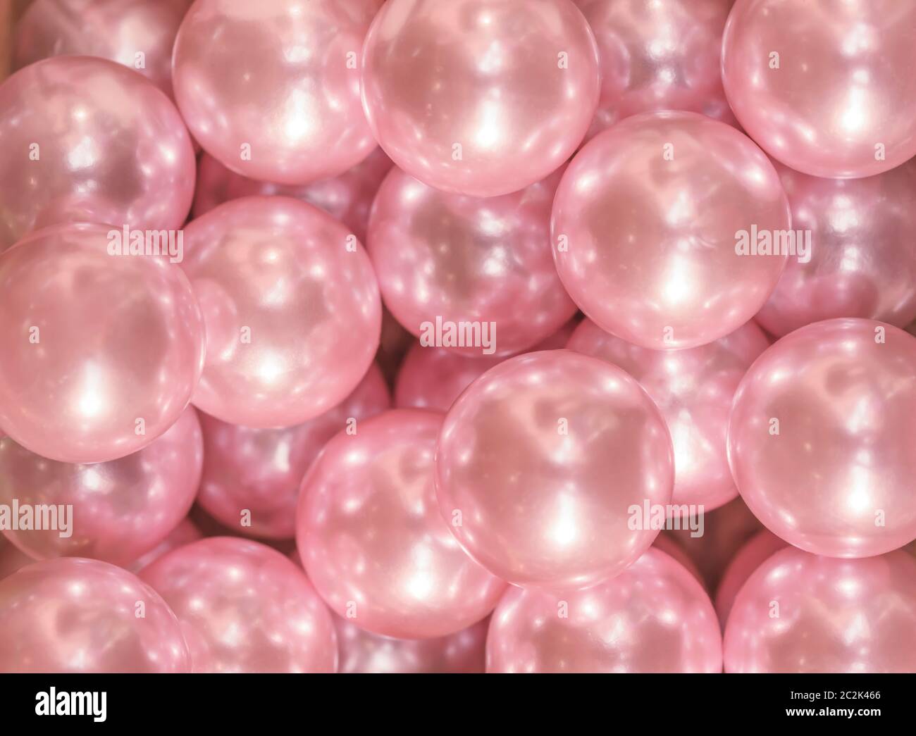 Cutout texture closeup on multiple pink shiny pearls Stock Photo - Alamy