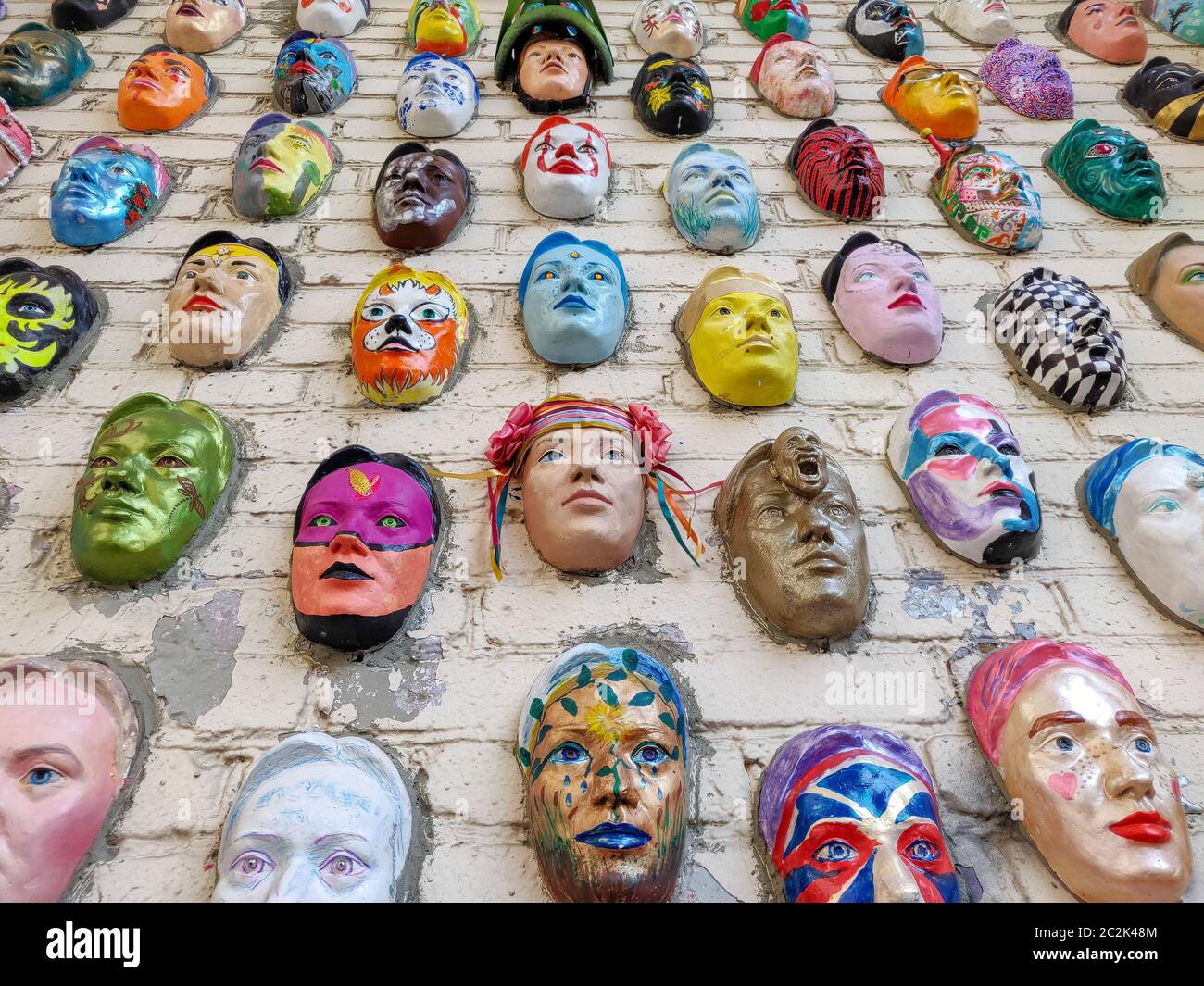 Moscow, Russia, 21 October 2019: Colorful painted ceramic faces ...