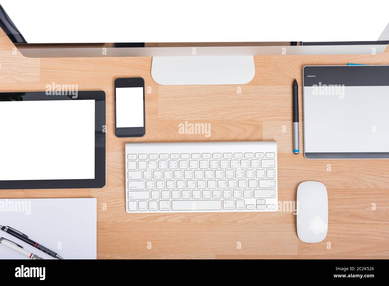 Top view computer PC monitor and keyboard with Phone, magic mouse and ...