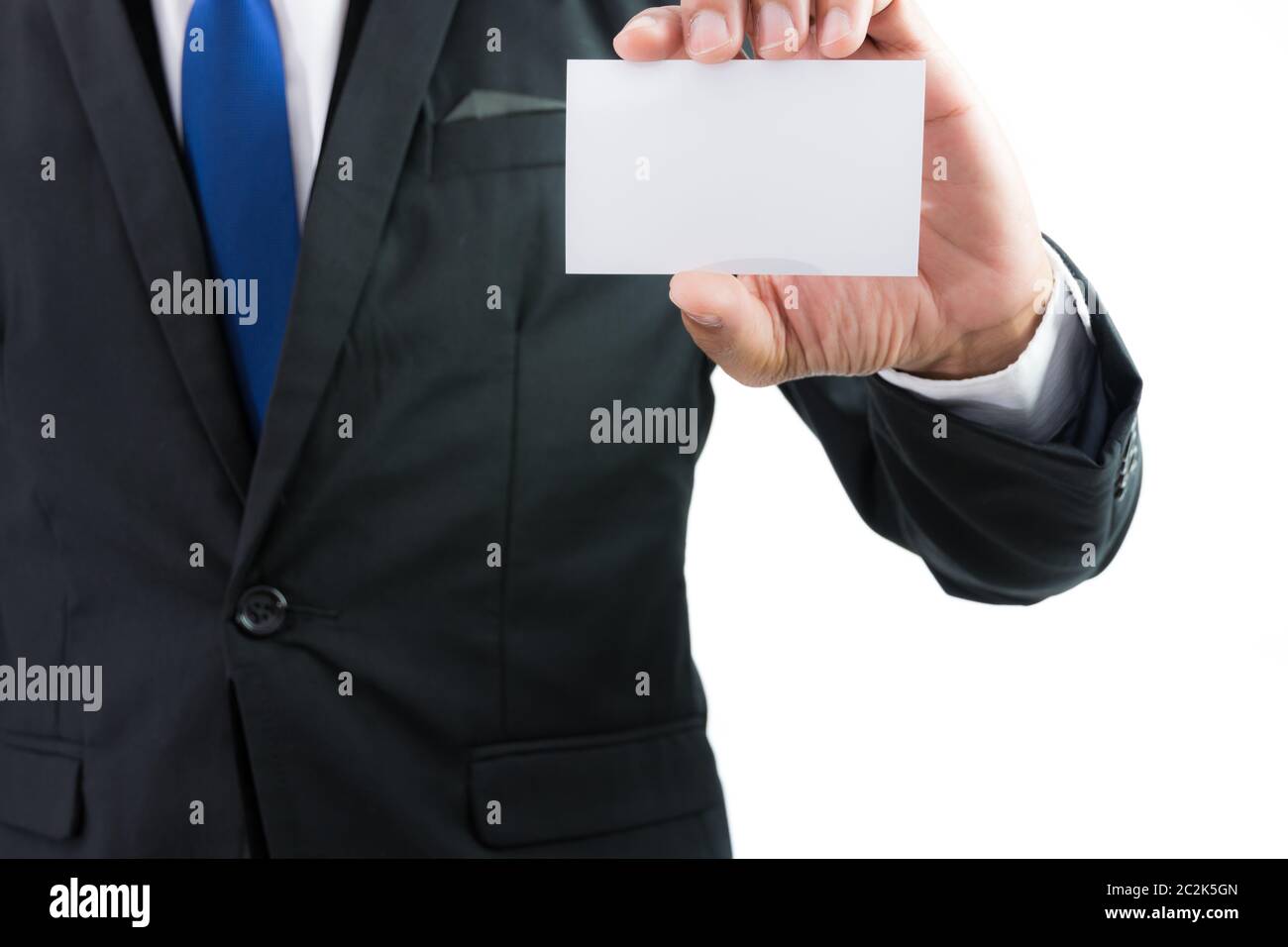 Businessman hand showing business card or note paper isolate on over ...