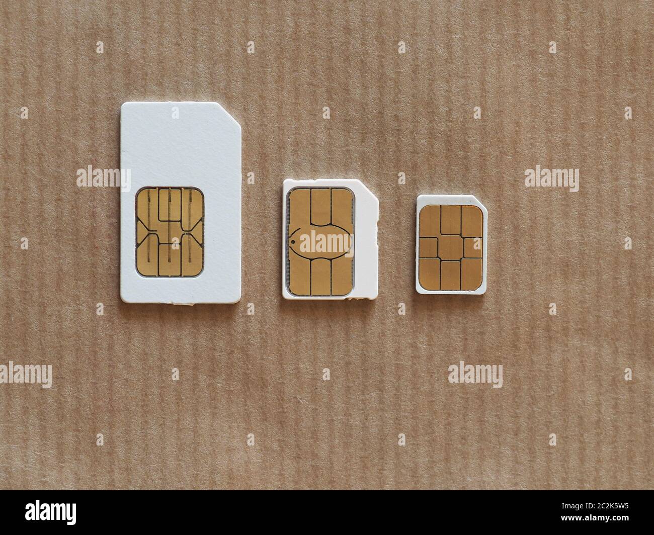 Mini, micro and nano sims for mobile phone Stock Photo - Alamy