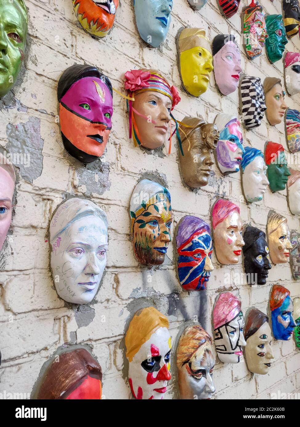 Moscow, Russia, 21 October 2019: Colorful painted ceramic faces ...