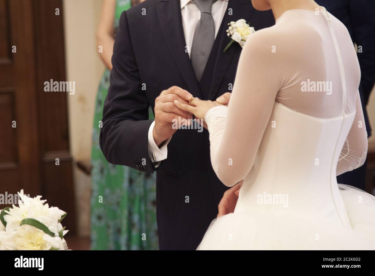 wedding scene in the church union of a couple Stock Photo - Alamy