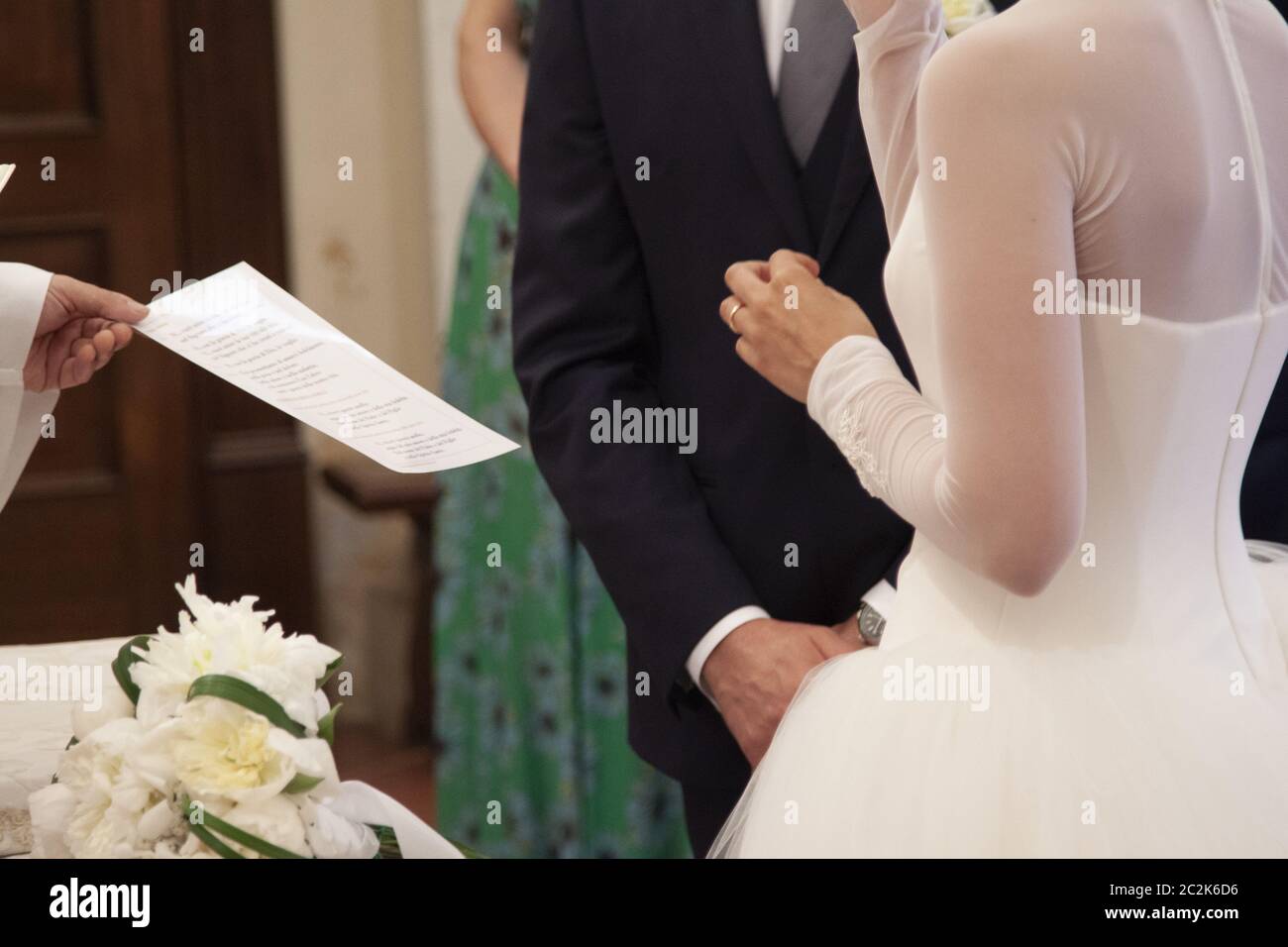 wedding scene in the church union of a couple Stock Photo - Alamy