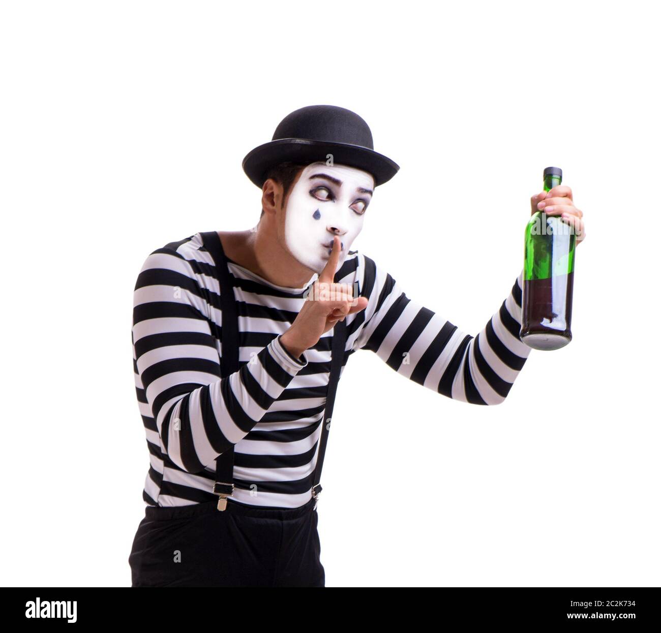 Mime drinking wine isolated on white background Stock Photo - Alamy