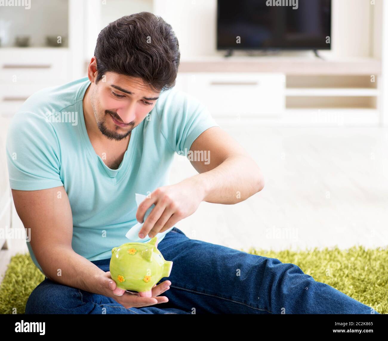 The young man struggling with personal finance and bills Stock Photo ...