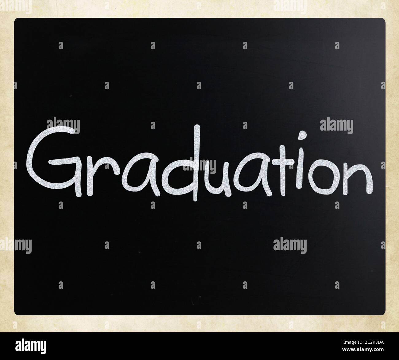 The word Graduation handwritten with white chalk on a blackboard Stock ...