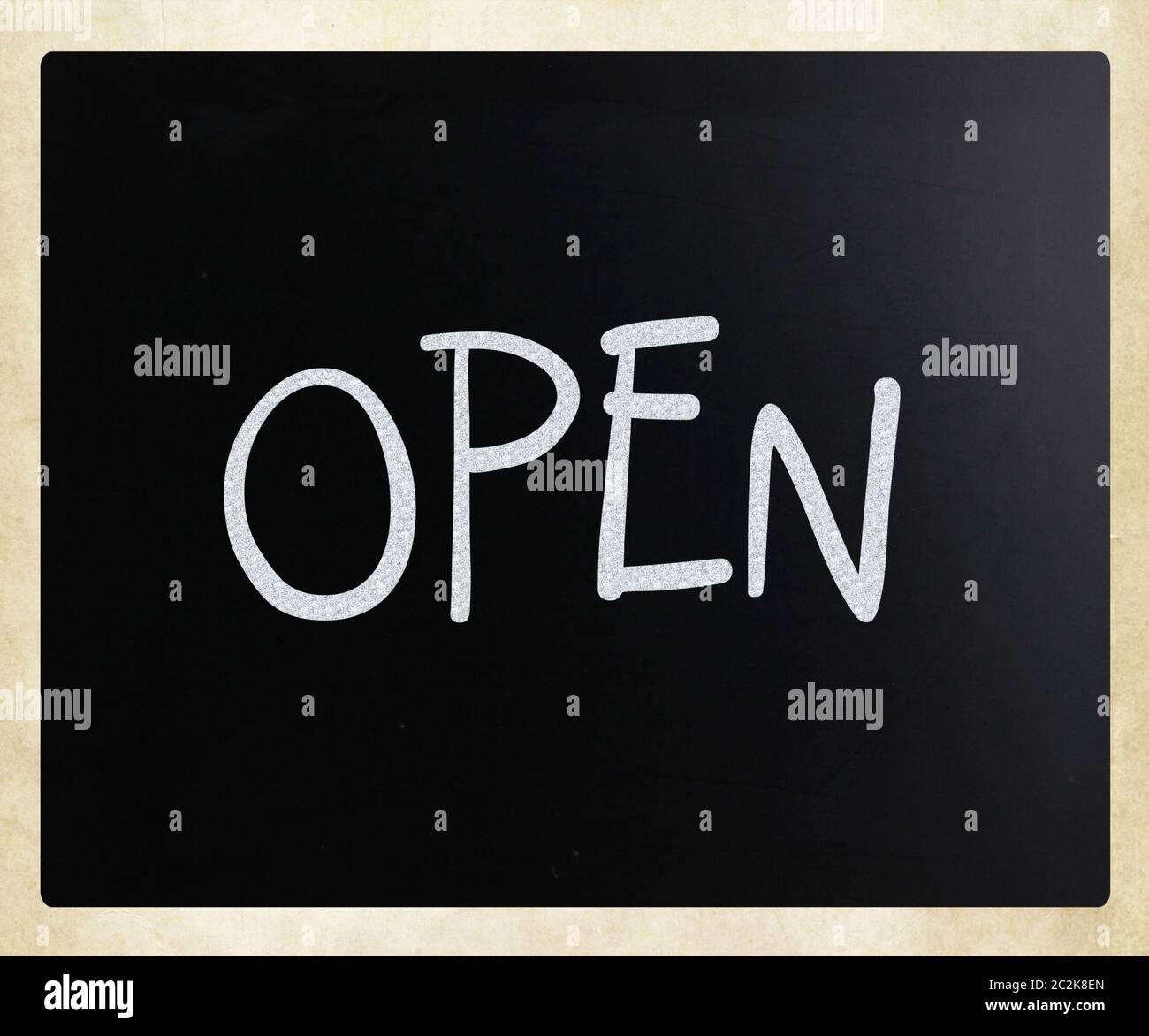 The word Open handwritten with white chalk on a blackboard Stock Photo ...