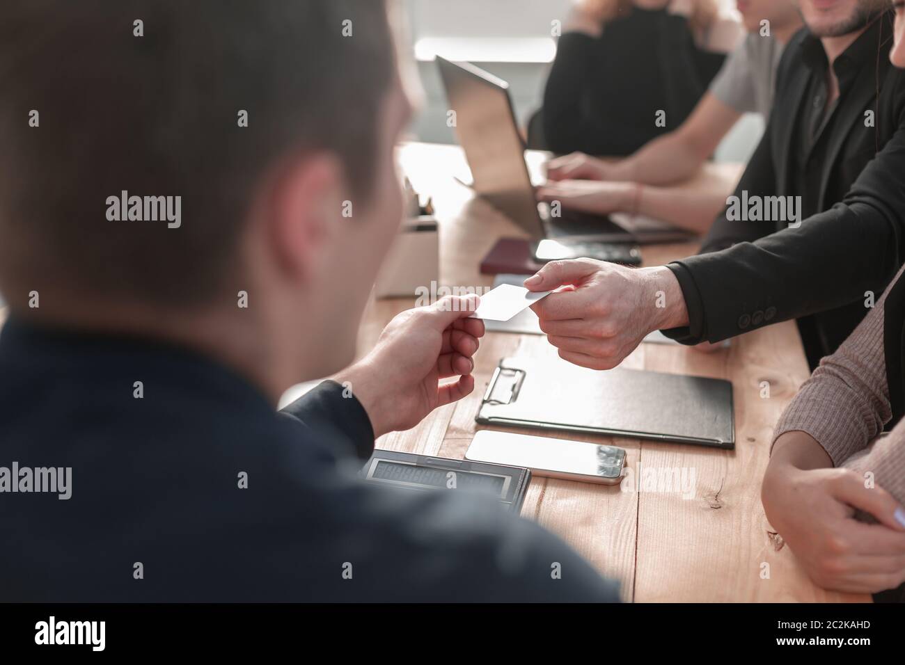 Group designers meeting around table hi-res stock photography and ...