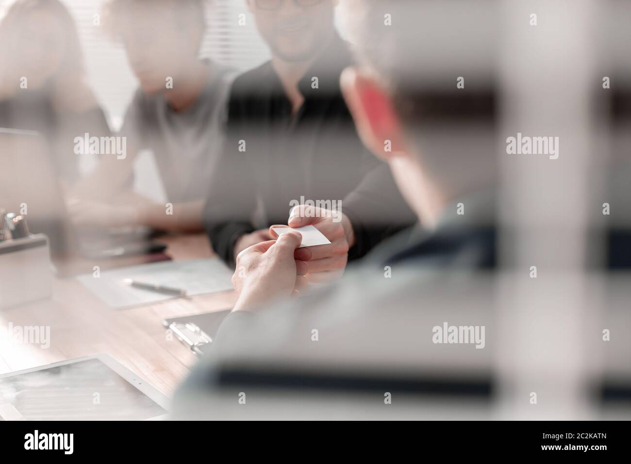 Group Of Designers Meeting Around Table In Modern Office Stock Photo ...