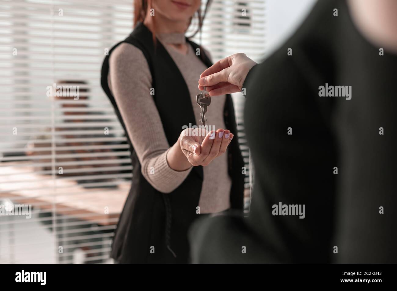 key transfer from person to person Stock Photo - Alamy