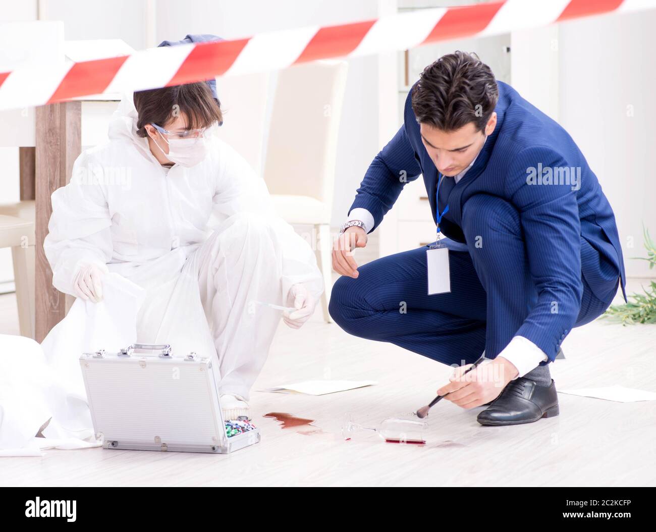The forensics investigator at the scene of office crime Stock Photo - Alamy
