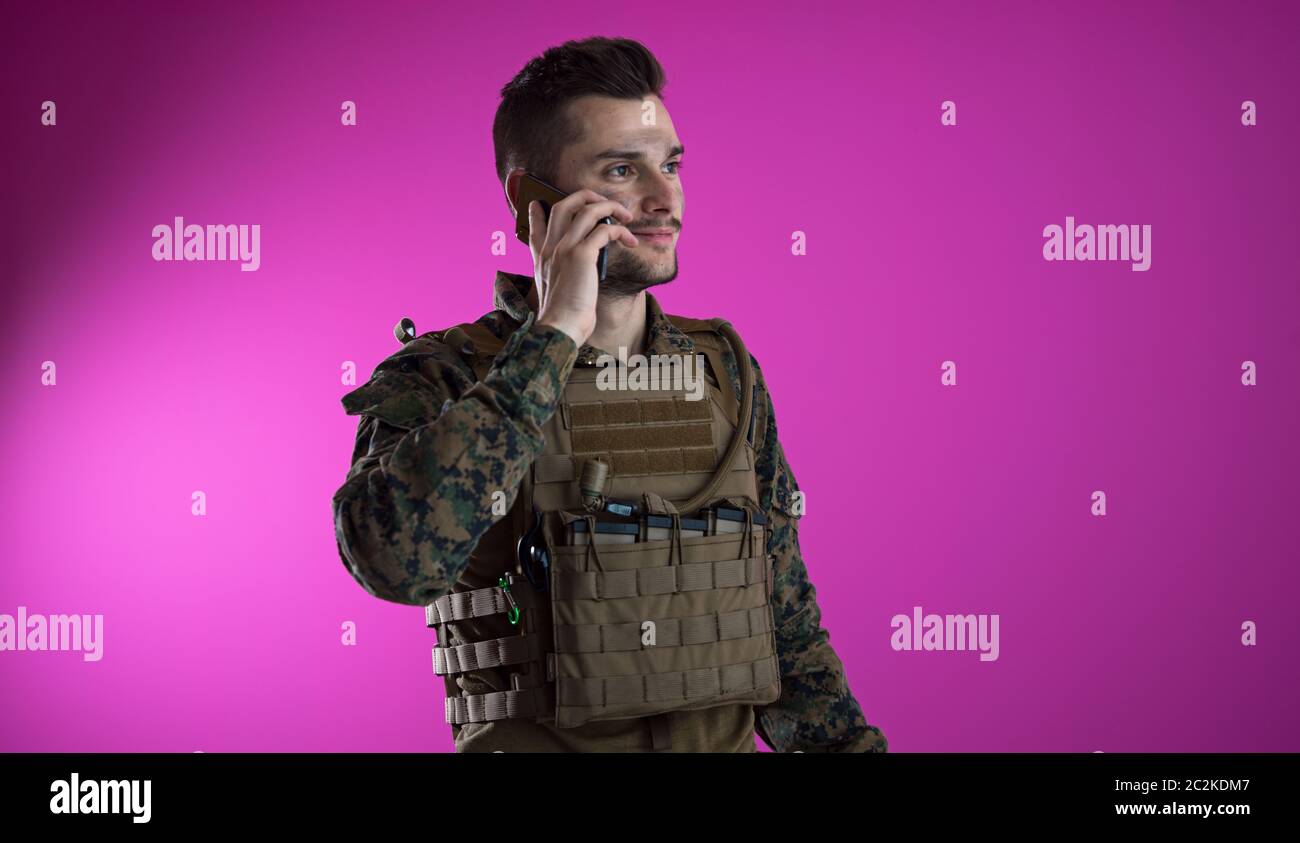 Happy military man using smartphone hi-res stock photography and images ...