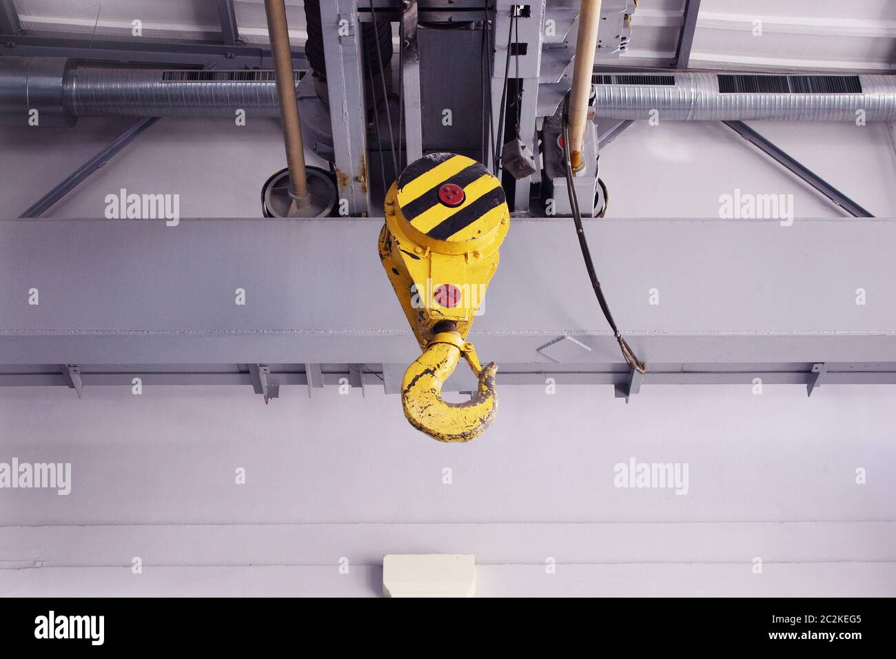 Swivel electric crane hook for overhead crane in the workshop Stock ...
