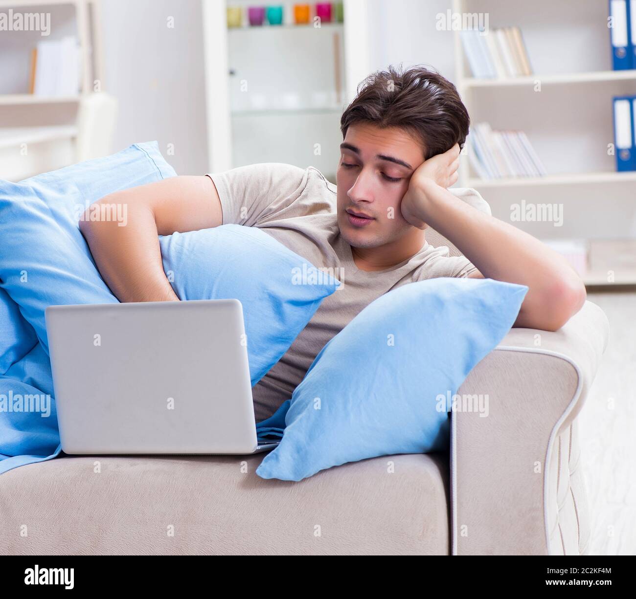 The man working late at his laptop at home Stock Photo - Alamy