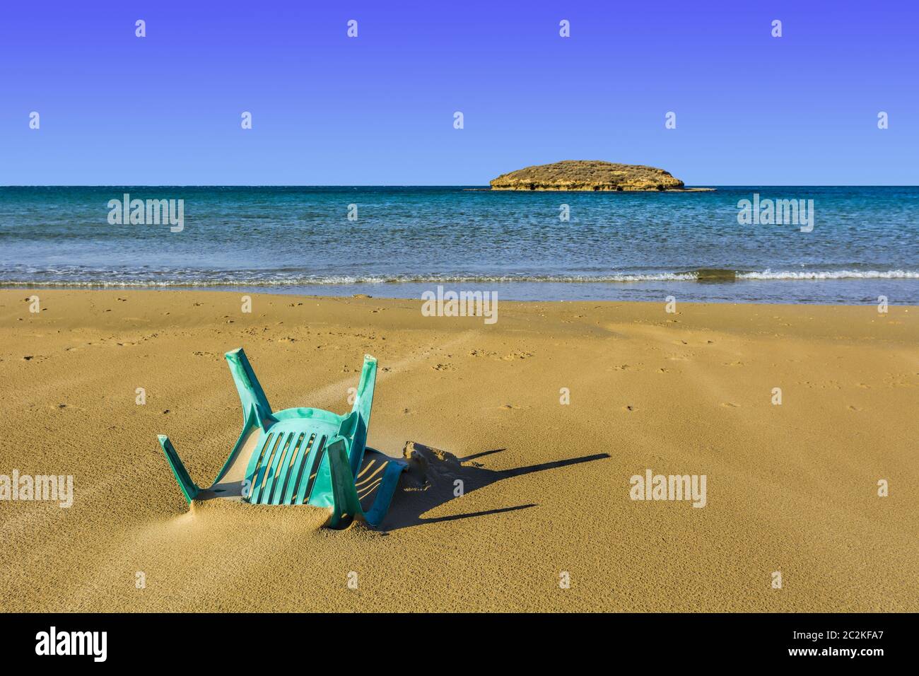 Chair in the Sand of Beach Stock Photo - Alamy